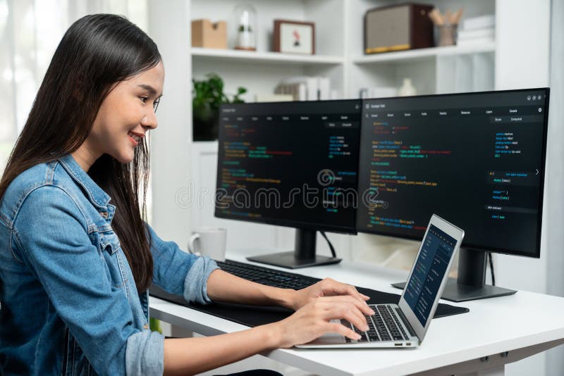 Smiling Asian it Typing Online Software Development on Laptop ...