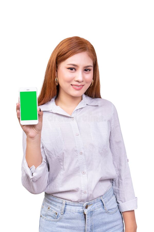 Smiling Asian Woman Standing In Casual Shirt Holding Mobile Phone And