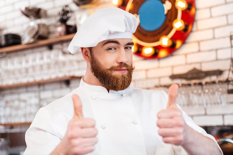 Smiling Attractive Chef Cook Showing Thumbs Up Stock Photo - Image of ...