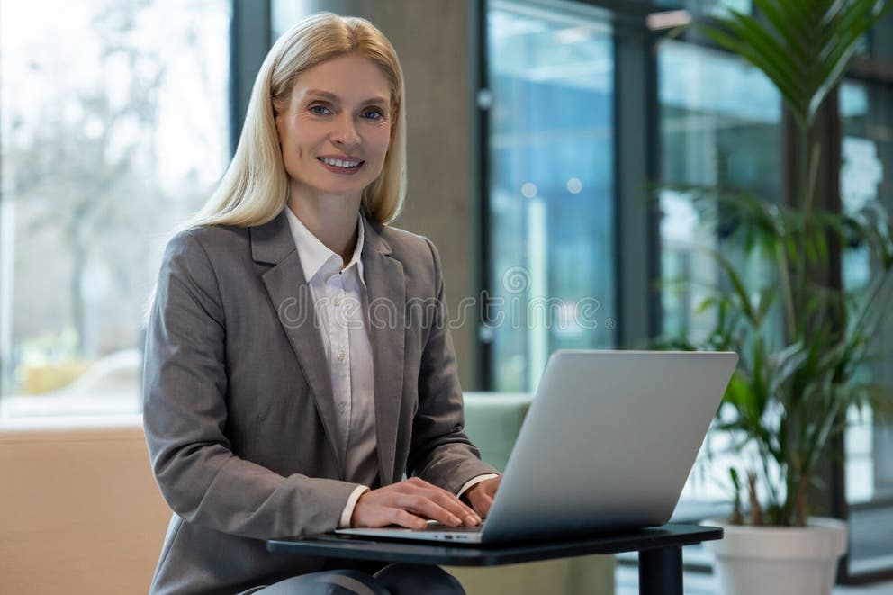 Smiling Attractive Employee Using Laptop on Couch for Online Work Stock ...