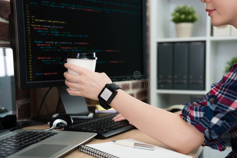 Attractive Female Programmer Wearing Smartwatch Stock Photo - Image of ...