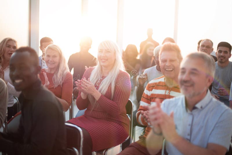 Smiling Audience Applauding at a Business Seminar Stock Image - Image ...
