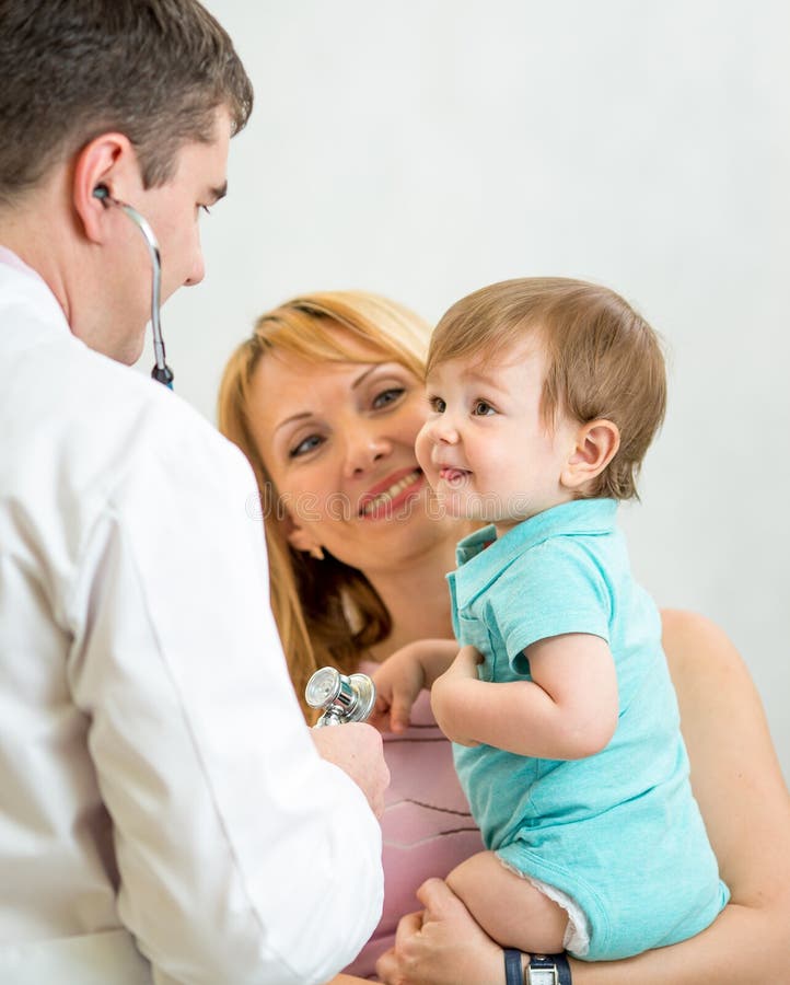 Smiling Baby Being Checked by a Doctor Using a Stethoscope Stock Photo ...