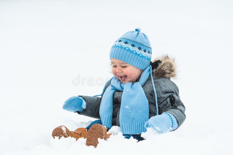Smiling Baby Boy Playing in the Snow Stock Image - Image of winter ...