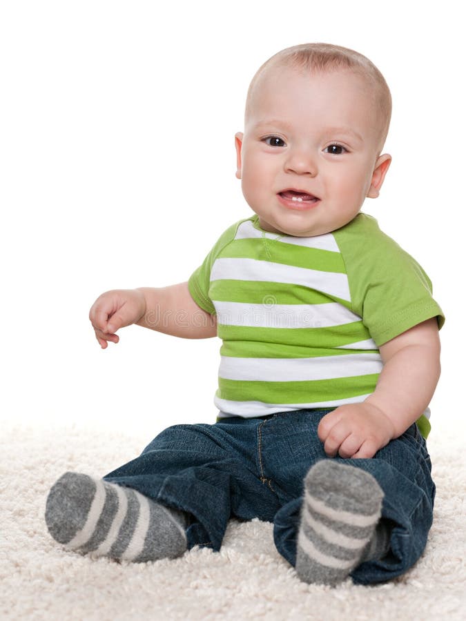 Baby boy on the carpet stock photo. Image of european - 24071752