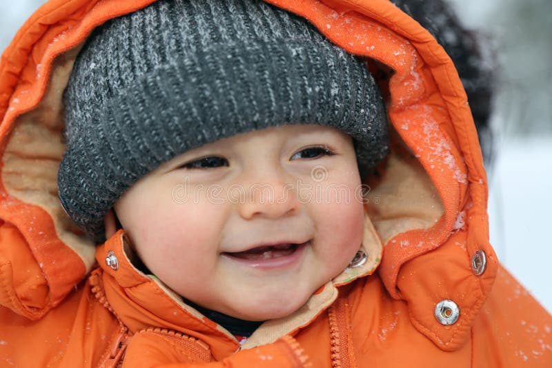 Smiling Baby with Snow in Winter Stock Photo - Image of portrait ...