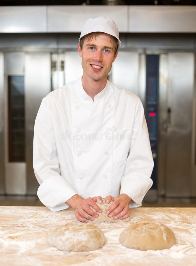 Smiling Baker Kneading Dough in Bakery Stock Image - Image of pretty ...