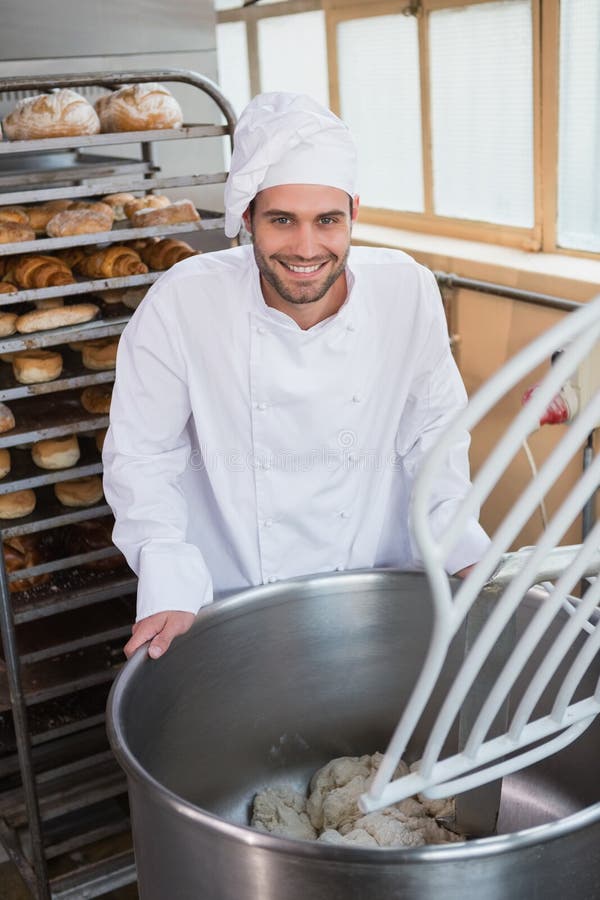 Smiling Baker Preparing Dough in Industrial Mixer Stock Image - Image ...