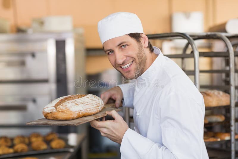 Smiling Baker Smelling Fresh Bread Stock Image - Image of person, hotel ...