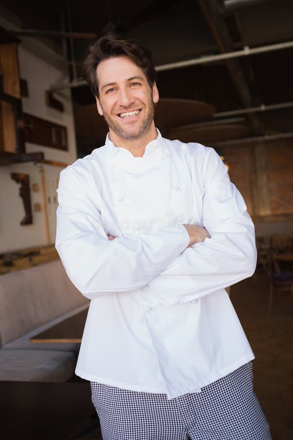 Smiling Baker Standing with Arms Crossed Stock Image - Image of male ...