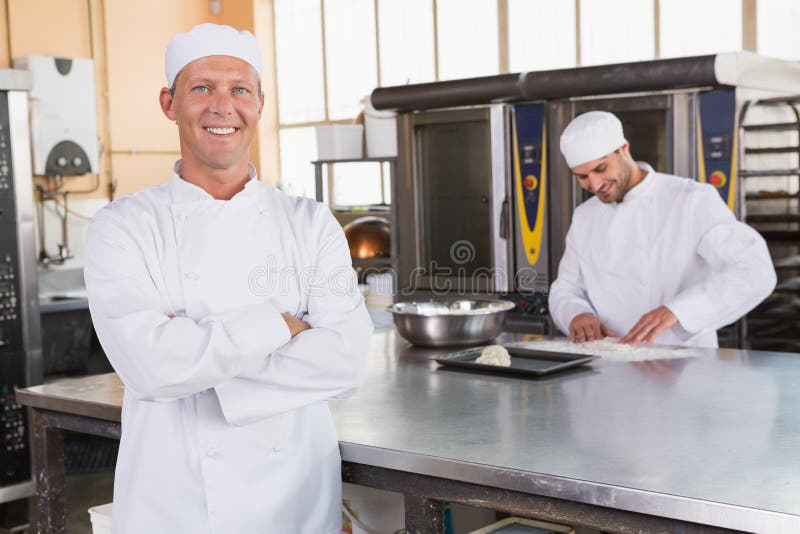 Smiling Baker Standing with Arms Crossed Stock Photo - Image of happy ...