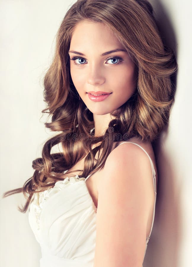 Smiling Beautiful Girl, Brown Hair with an Elegant Hairstyle , Hair ... Smiling Beautiful Girl, Brown Hair with an Elegant Hairstyle , Hair ...