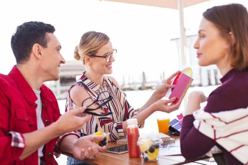 Smiling Beautiful Interior Designer Interacting with Clients Stock ...