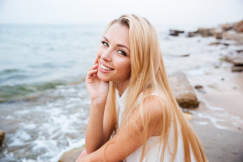Smiling Beautiful Young Woman on the Beach Stock Image - Image of ...