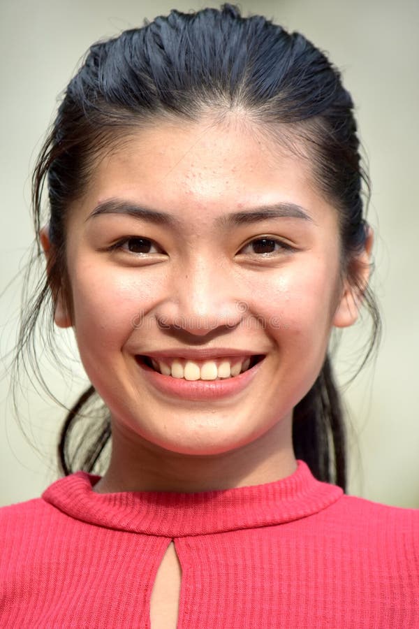 A Smiling Beautiful Youngster Stock Photo - Image of looking, happiness ...