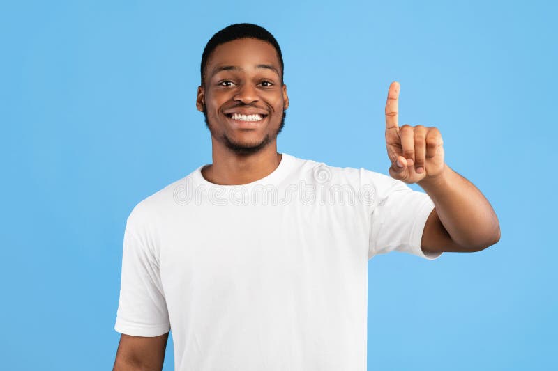 Smiling Black Guy Showing Number One Finger Studio Shot Stock Photos ...