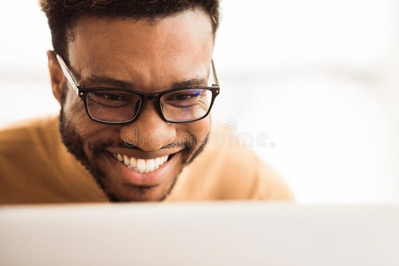 Smiling Black Man Coder Looking at Laptop Stock Photo - Image of ...