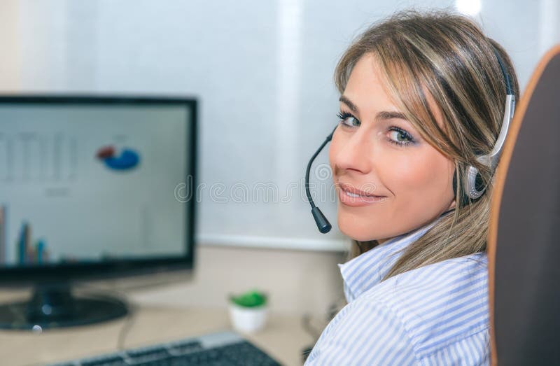Smiling Blonde Secretary Working with Computer in Office Stock Photo ...