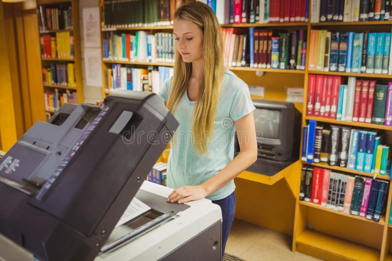 Smiling Blonde Student Making a Copy Stock Image - Image of photocopier ...