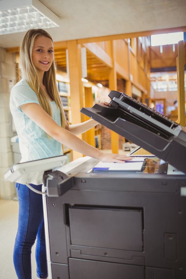 Smiling Blonde Student Making a Copy Stock Photo - Image of ...