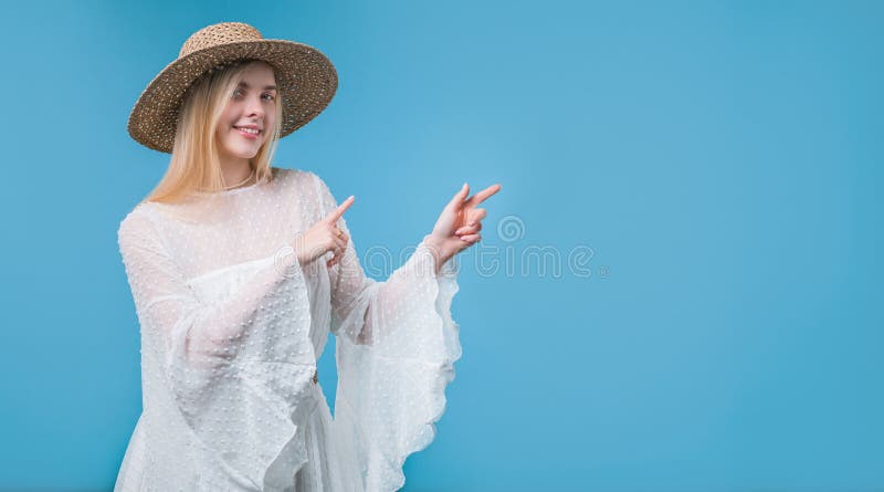 Recommending Smiling Teenager Girl Pointing At Side Copy Space Or