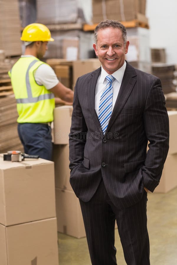 Smiling Boss Standing with Hands in Pockets Stock Image - Image of ...