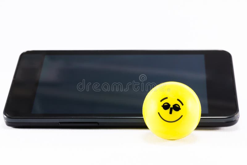 Smiling Bouncing Ball Near Mobile Phone Stock Photo - Image of cell ...