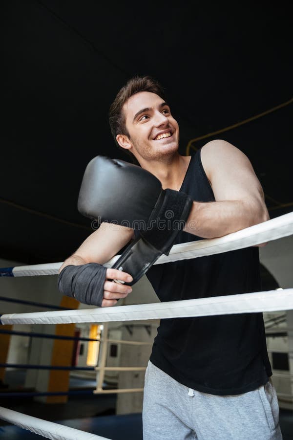 Smiling Boxer Wearing Boxing Gloves and Looking Away Stock Image ...