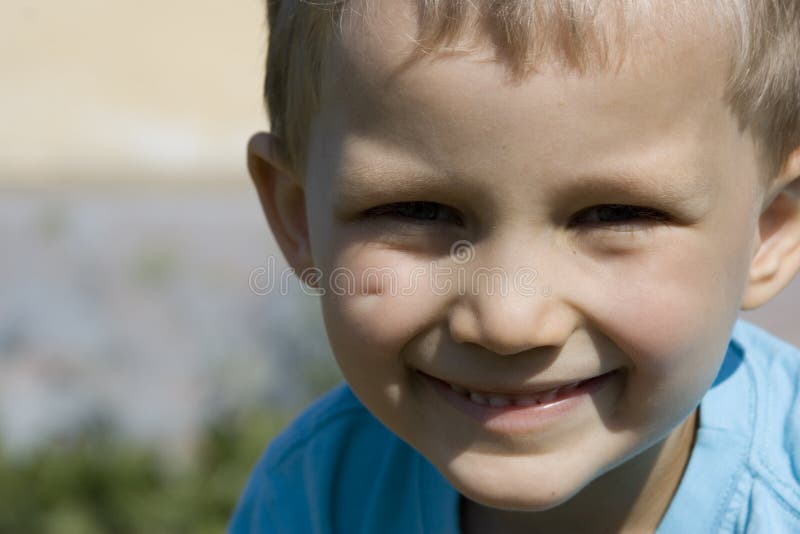 Smiling boy stock photo. Image of happy, face, faces, hearted - 1057334