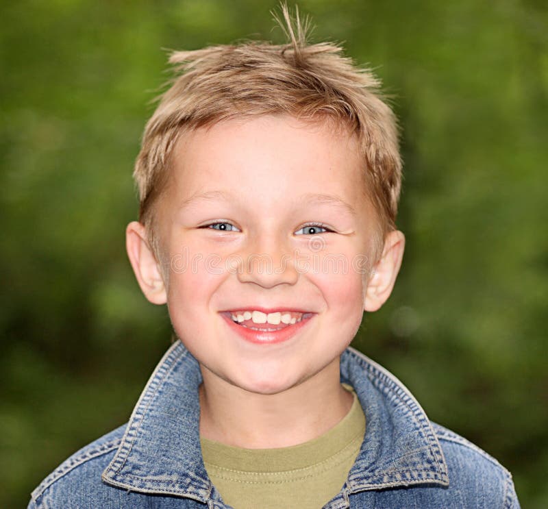 Smiling boy stock photo. Image of isolated, student, green - 10495582