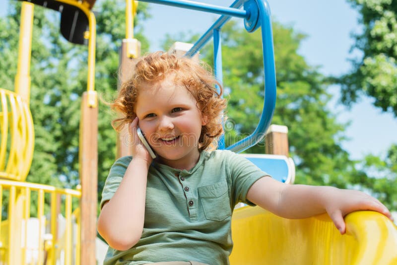 Smiling Boy Calling on Mobile Phone Stock Image - Image of emotion ...