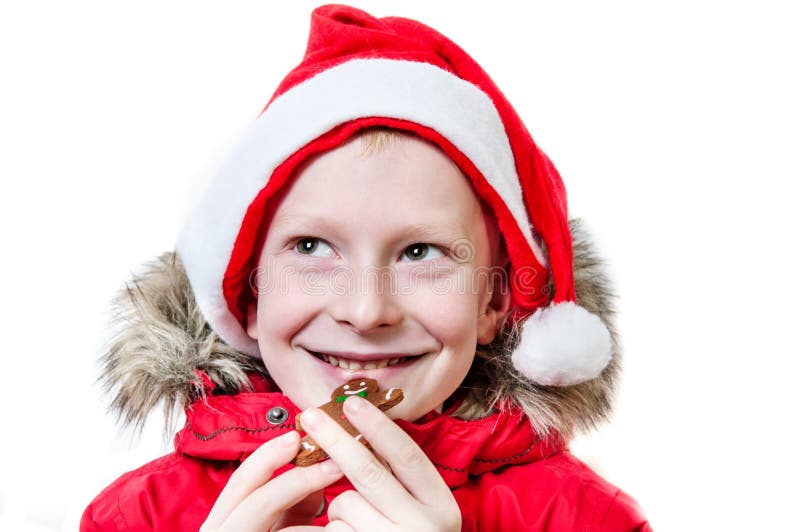 Smiling Boy Eating Gingerbread Man. Stock Photo - Image of santa ...