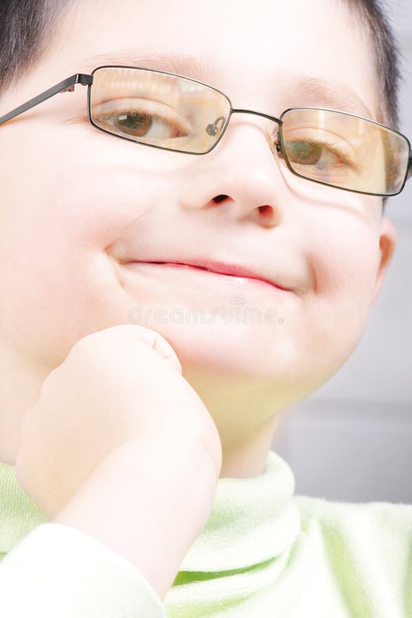 Smiling boy in eyeglasses stock image. Image of portrait - 12485299