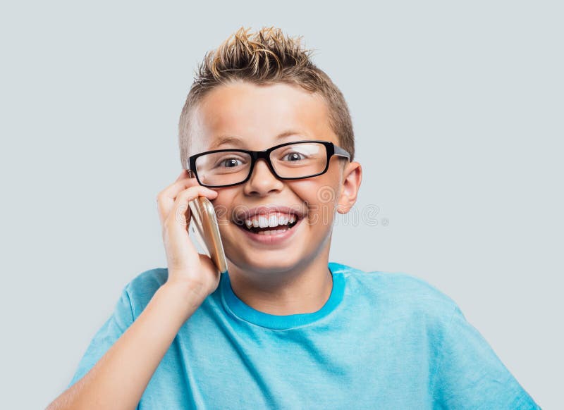 Smiling Boy Having a Phone Call Stock Photo - Image of screen, glasses ...
