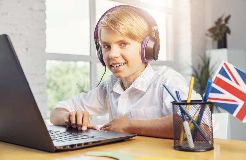 Smiling Boy at the Laptop Learning English Stock Image - Image of class ...