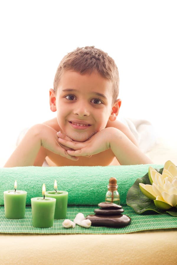 Smiling Boy Lying on the Massage Table Stock Photo - Image of table ...