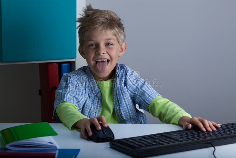 Smiling Boy Playing Computer Stock Photo - Image of keyboard, playing ...