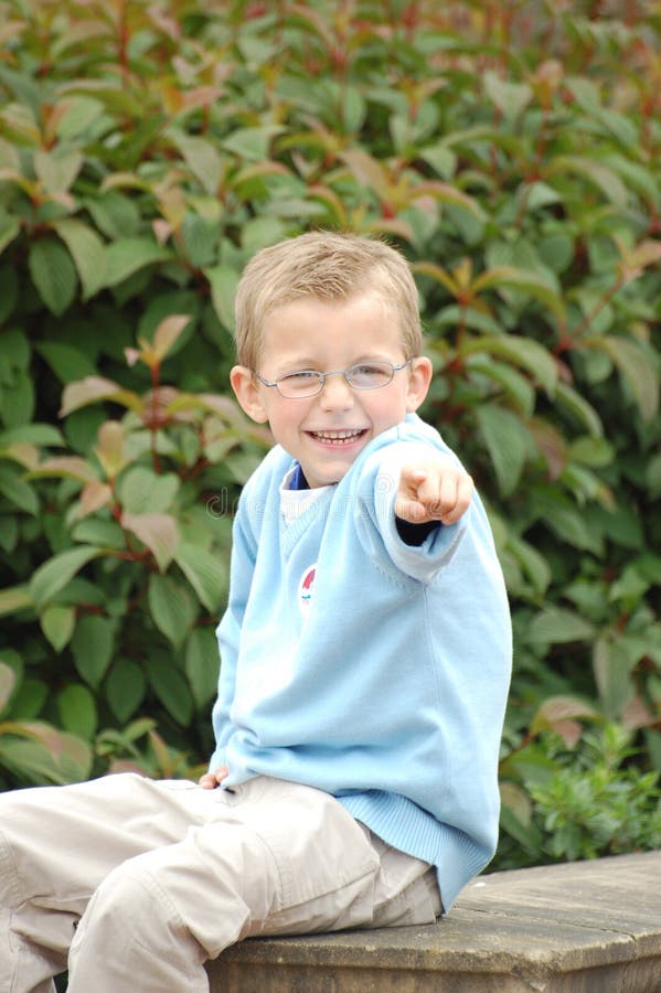 Smiling Boy Pointing stock photo. Image of ecstatic, enjoy - 9489386