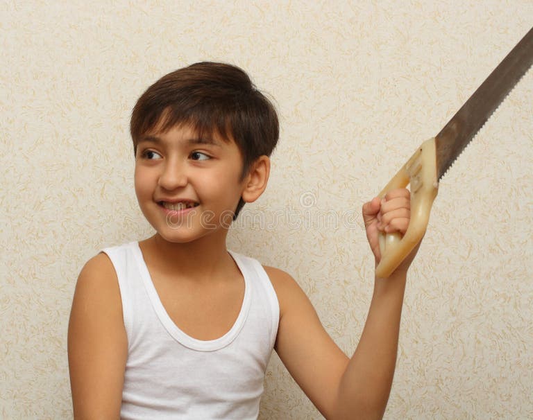 Smiling boy with saw stock image. Image of helping, hardware - 3726015