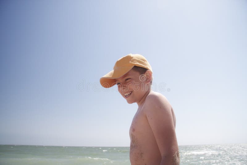 Smiling boy at sea stock image. Image of person, male - 12939929