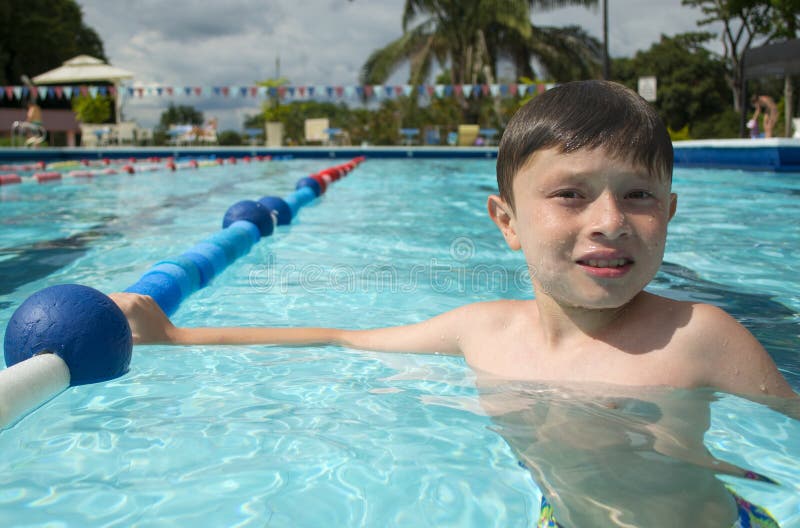 Smiling Boy in a Swimming Pool Stock Image - Image of swimming ...