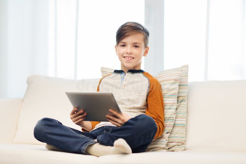 Smiling Boy with Tablet Computer at Home Stock Image - Image of person ...