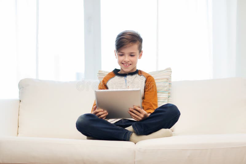 Smiling Boy with Tablet Computer at Home Stock Image - Image of ...