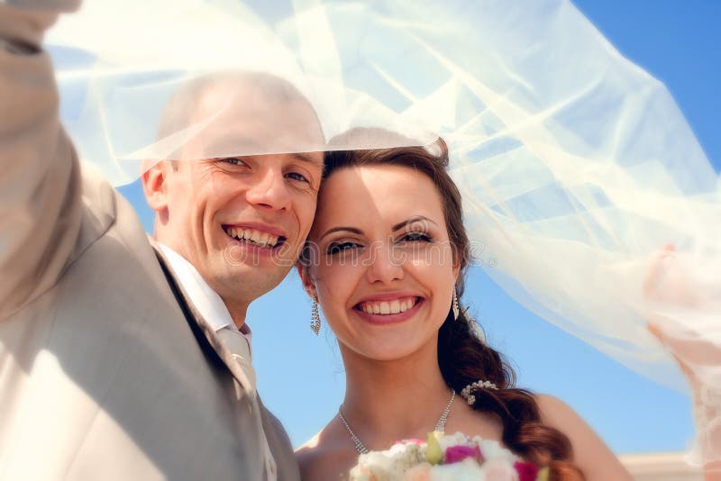 Smiling bride and groom stock photo. Image of happiness - 25697584