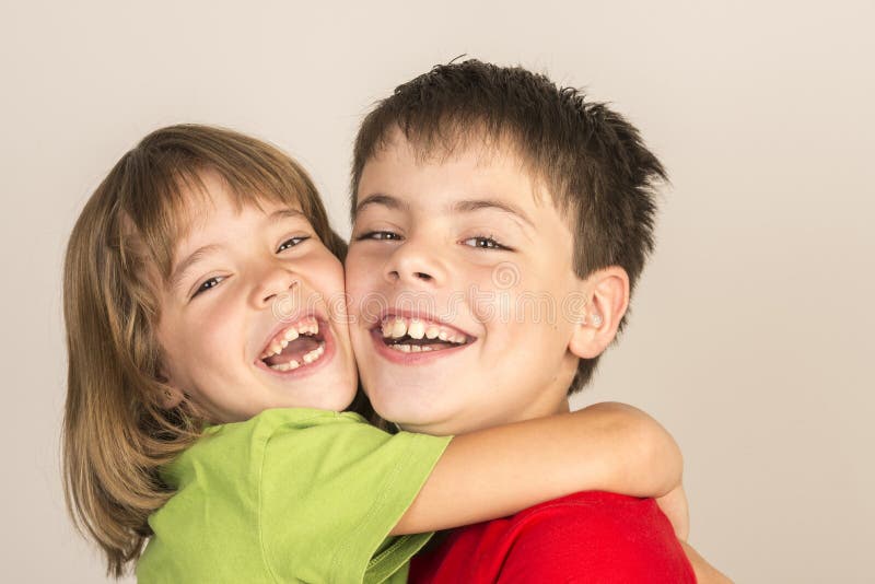 Smiling brothers stock image. Image of happiness, embrace - 45534789