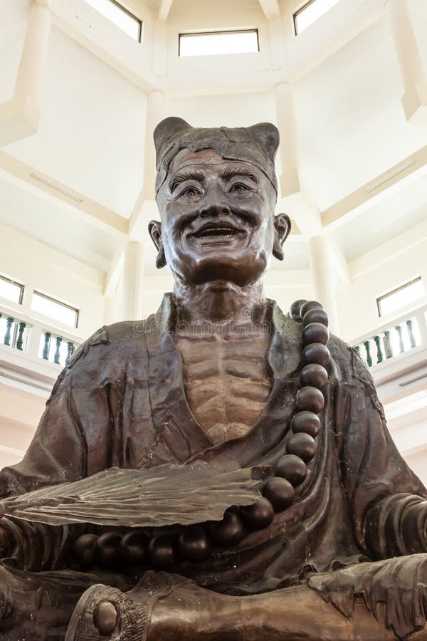 Smiling Buddha Chinese God stock photo. Image of east - 26855762