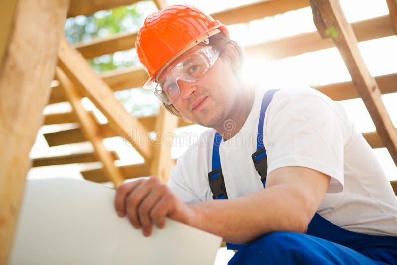Smiling builder stock photo. Image of build, making, hardhat - 16596792