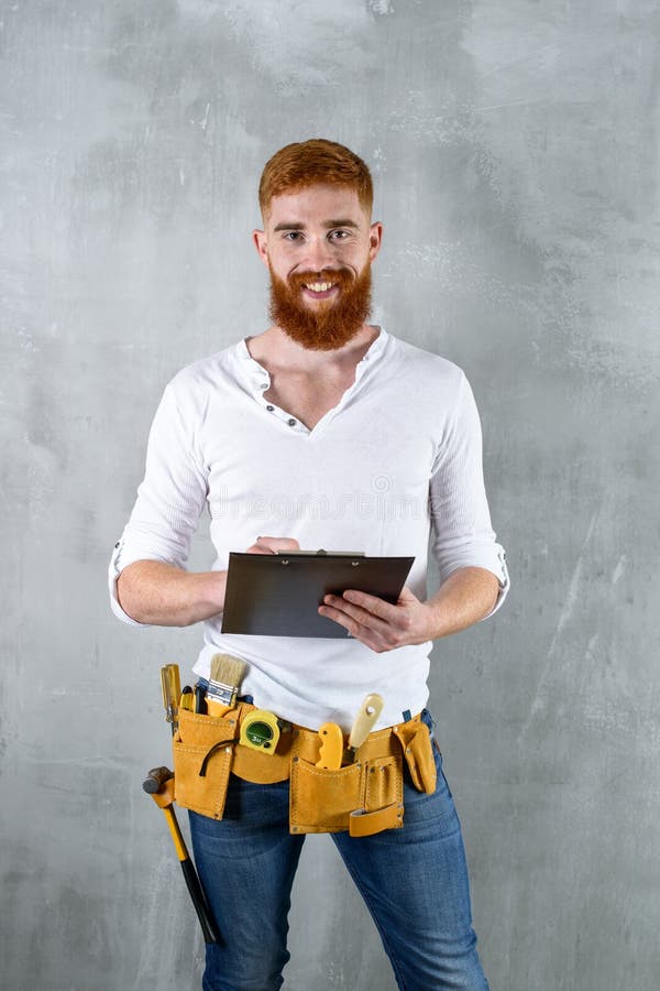 Smiling Builder Worker Making Notes Stock Photo - Image of builder ...