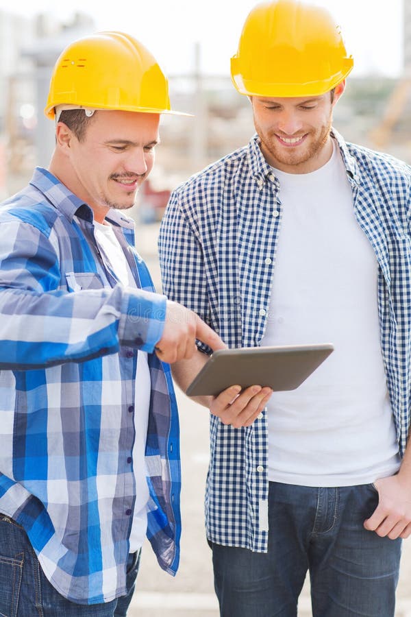 Smiling Builders with Tablet Pc Outdoors Stock Photo - Image of estate ...
