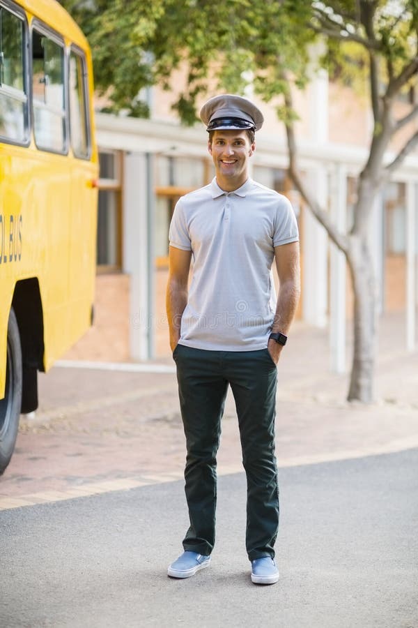 Bus Driver Smiling in Front of Bus Stock Photo - Image of looking ...